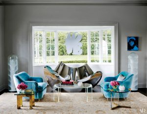 9 Upholstered Chairs That Will Add A Pop Of Color To Your Home Decor