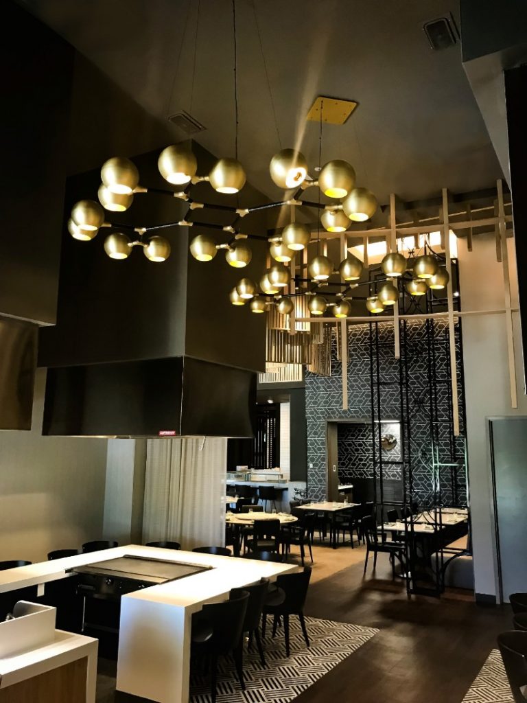 HORUS suspension light by BRABBU , gives this ambience a golden touch ...